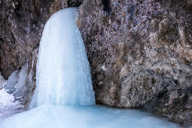 Icefall on a rock wall. stock photo. Image of europe - 107423668