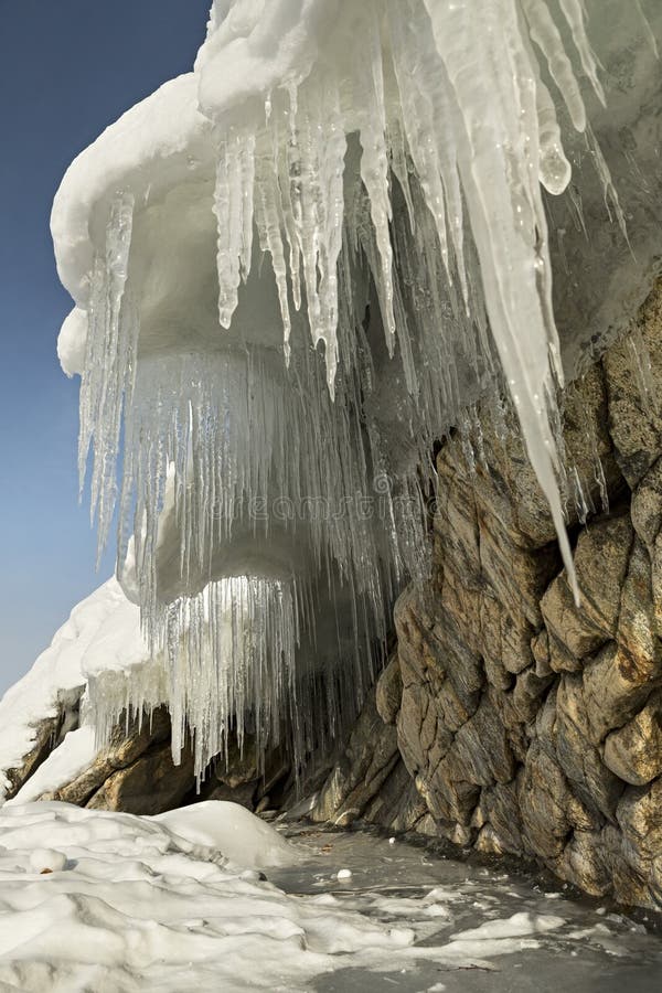 Huge icicles on rocks. stock photo. Image of rock, beautiful - 68769914