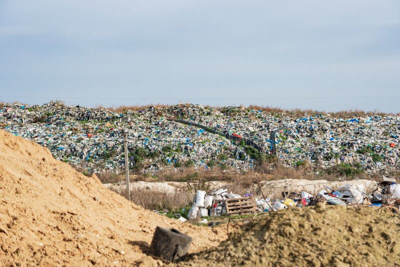 Huge Landfill of Garbage. a Worker at a Landfill Stock Image - Image of ...