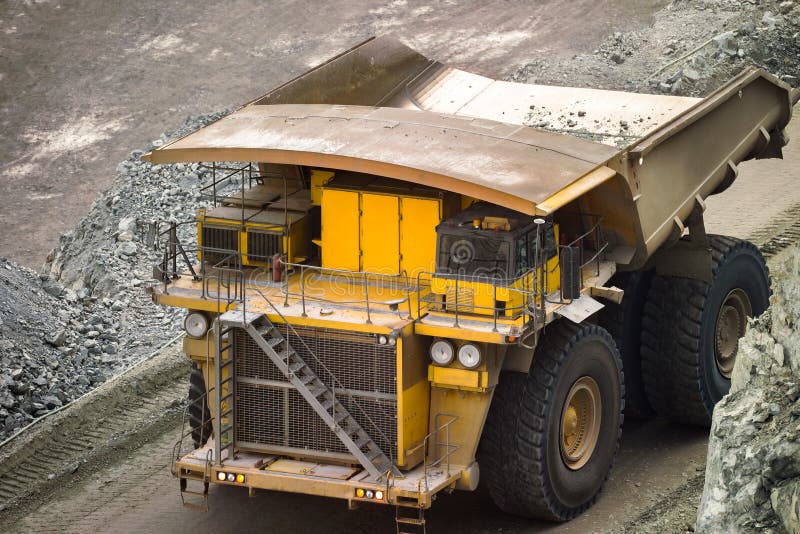 Large Dump Truck Delivering Gravel To Commercial Construction Site ...