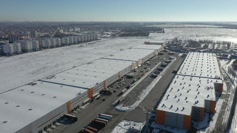 Logistics Warehouse is Huge. Loading Trucks with Goods on a Ramp Stock ...