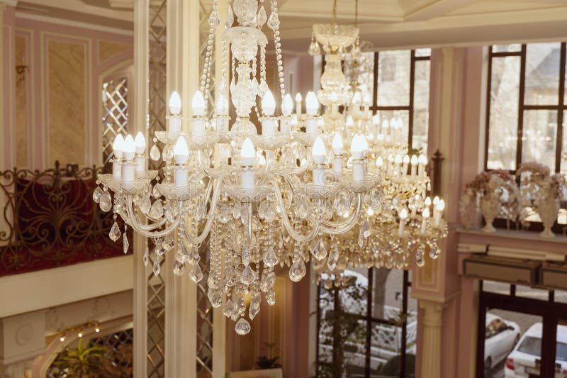 Huge and Luxurious Chandelier on the Ceiling in the Hall. Stock Photo ...
