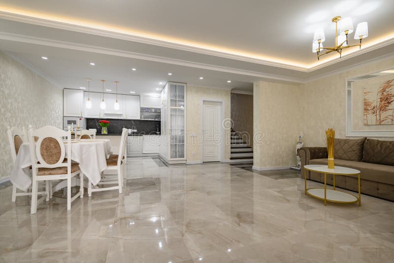 Huge Luxurious Home Studio Kitchen with Marble Floor Stock Photo ...