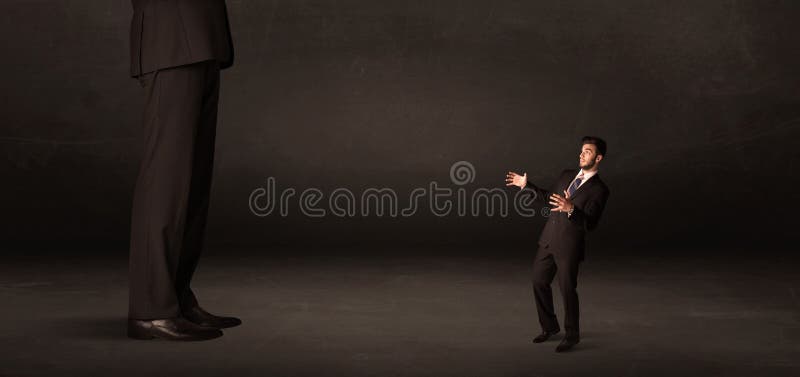 Huge Man with Small Businessman Standing at Front Concept Stock Photo ...