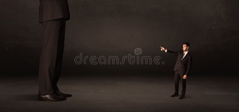 Huge Man with Small Businessman Standing at Front Concept Stock Photo ...