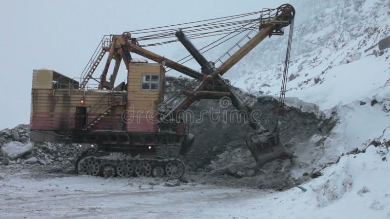 Mining Excavator Loading Sand in Dumper Truck at Sand Quarry. Excavator ...