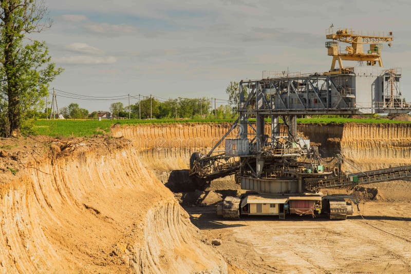 Huge Mining Machine a Open Pit Brown Coal Mine Stock Photo - Image of ...