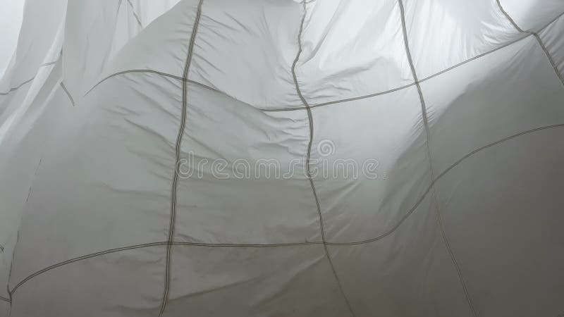 A Huge Parachute Suspended from the Ceiling in the Pavilion Sways in ...