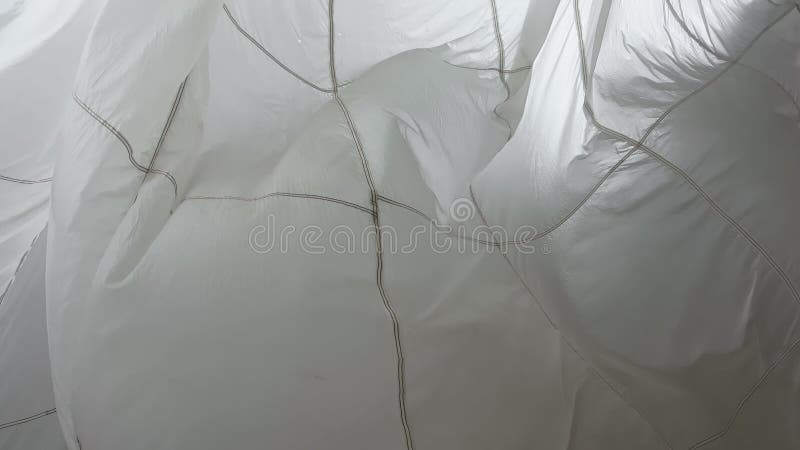 A Huge Parachute Suspended from the Ceiling in the Pavilion Sways in ...