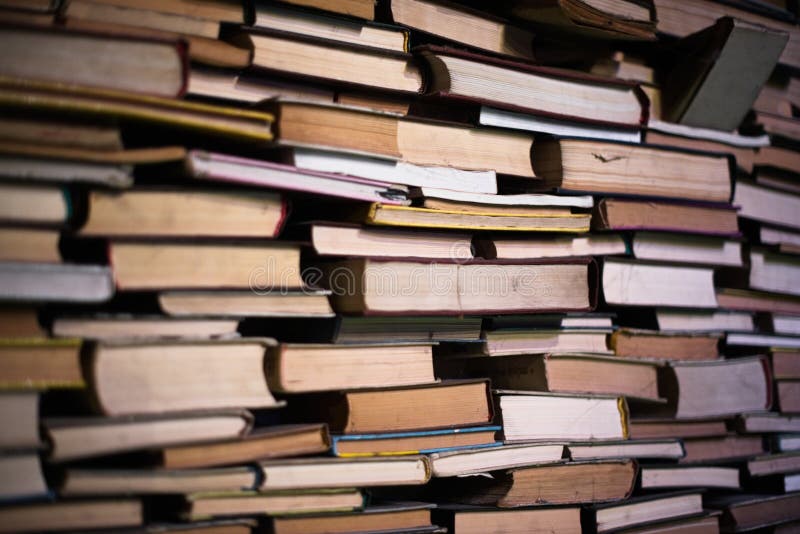 A Huge Pile of Different Books in the Library. a Library Full of Books ...