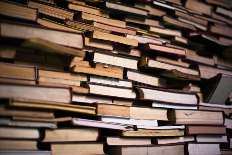A Huge Pile of Different Books in the Library. a Library Full of Books ...