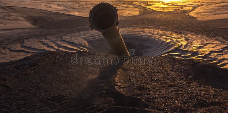 Huge Pipe Coming Out of the Ground with a Colorful Blurred Ground Stock ...