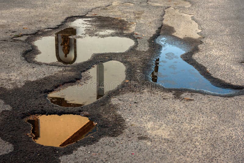Puddles Concrete Driveway Stock Photos - Free & Royalty-Free Stock ...