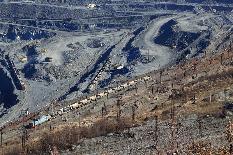 Huge Quarry for the Extraction of Iron Ore from a Moving Train Gubkin ...