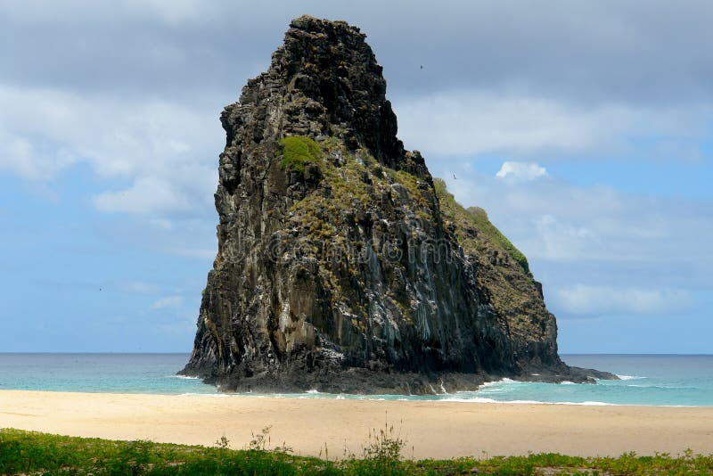 Huge rock formation stock image. Image of beach, clouds - 5491879