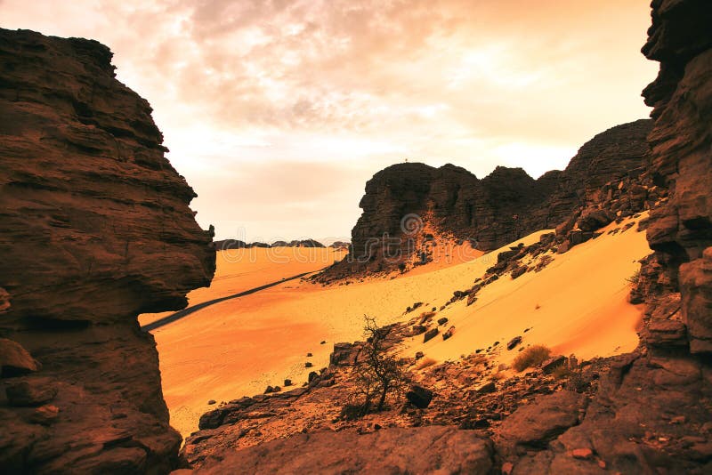 Huge Rocks in the Desert Against a Cloudy Sky Stock Image - Image of ...