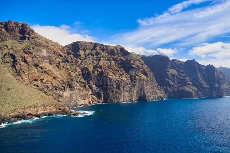 Huge Rocks on the Ocean Shore. Azure Salt Water Breaks on Rocks Stock ...