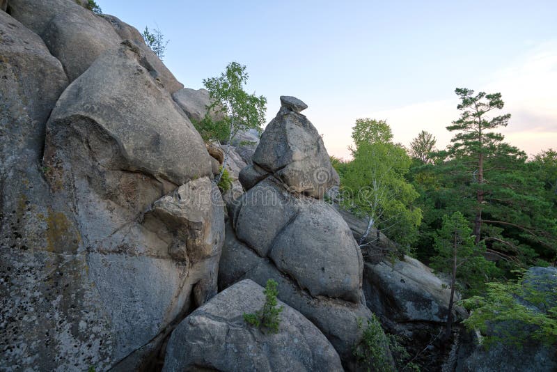 Huge Rocky Boulder Formations High in Mountains with Growing Trees on ...