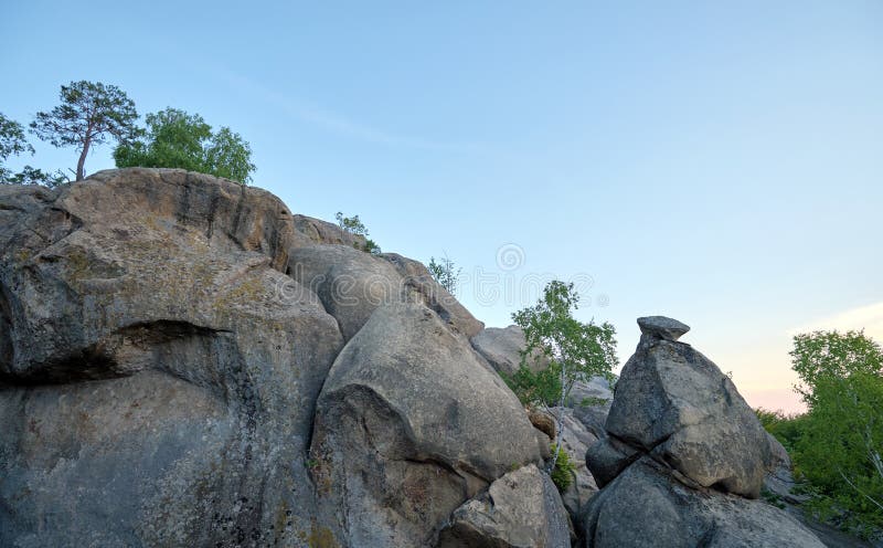 Huge Rocky Boulder Formations High in Mountains with Growing Trees on ...