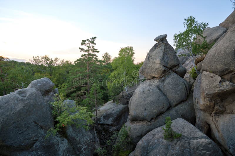 Huge Rocky Boulder Formations High in Mountains with Growing Trees on ...