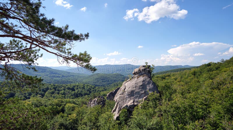 Huge Rocky Boulder Formations High in Mountains with Growing Trees on ...