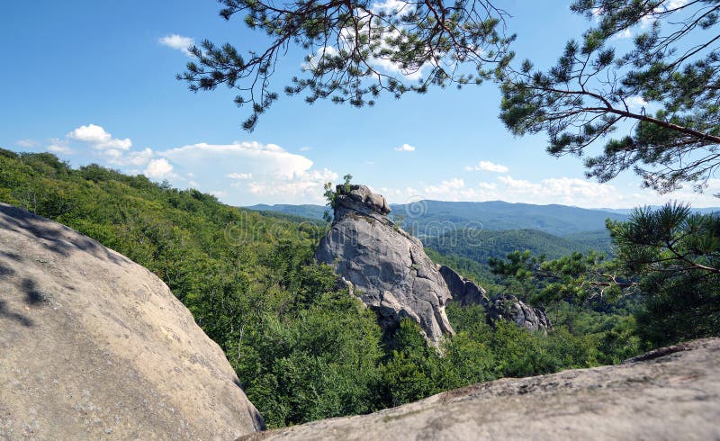 Huge Rocky Boulder Formations High in Mountains with Growing Trees on ...
