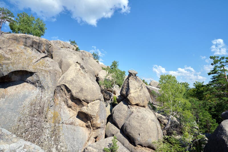 Huge Rocky Boulder Formations High in Mountains with Growing Trees on ...
