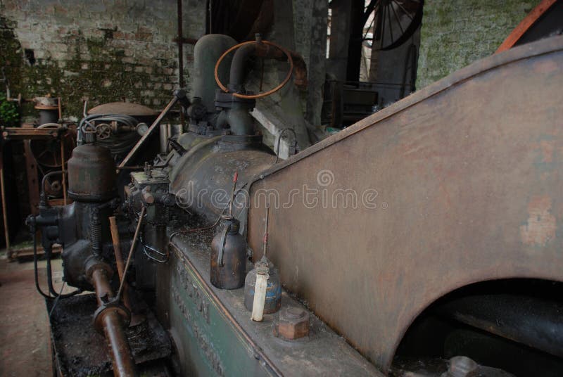 Huge Rusty Old Machine in Shed with Oil Cans Stock Photo - Image of ...