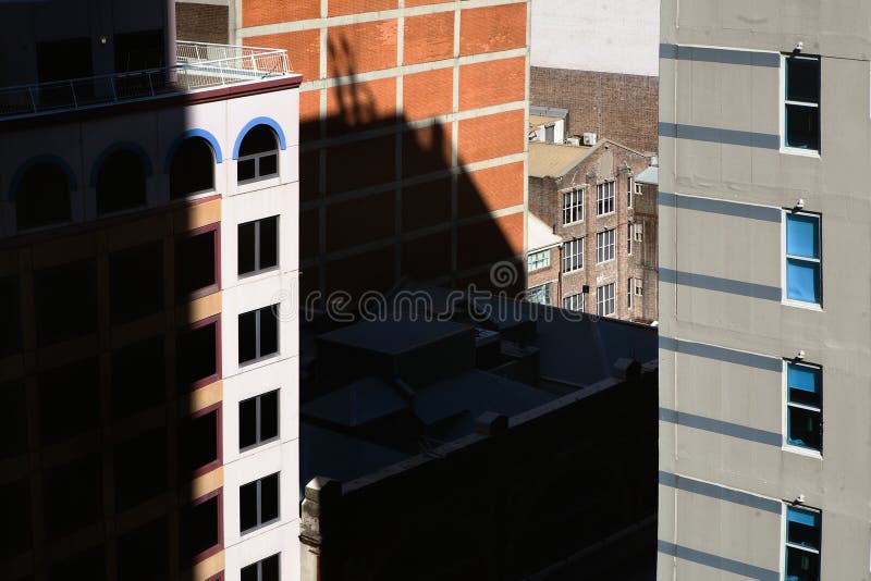 Huge Shadow on the Modern Stone Buildings on a Sunny Day Stock Photo ...