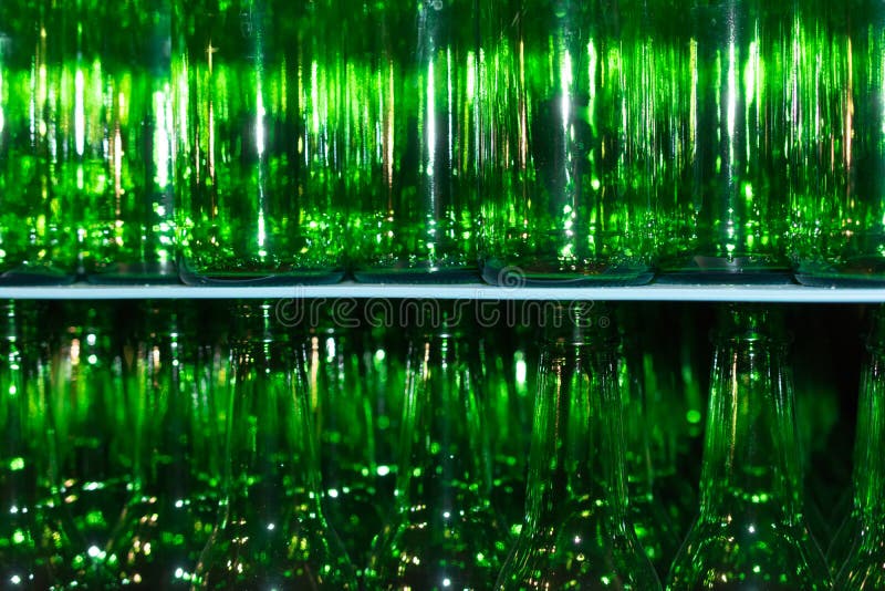 Huge Stack of Empty Glass Bottles on Blue Table Stock Photo - Image of ...