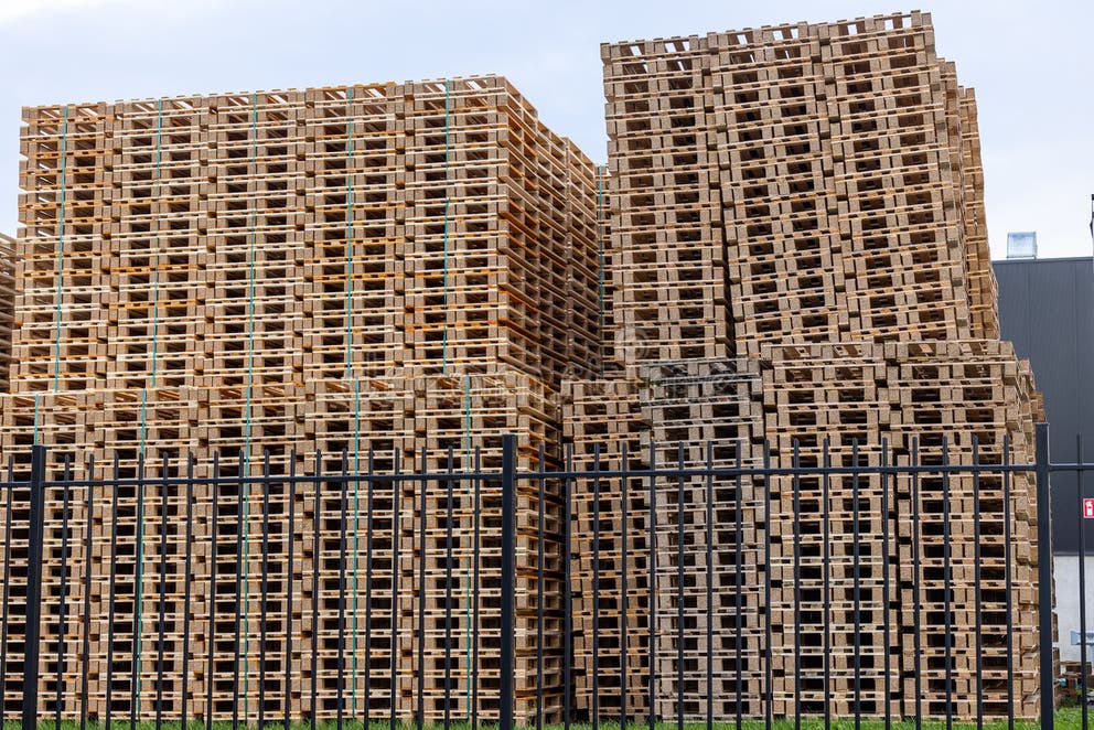 Huge Stack of Wooden Pallets Stock Photo - Image of massive, plank ...