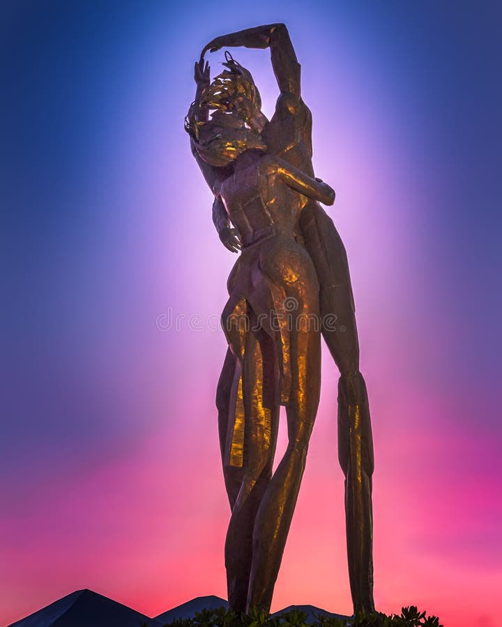 Huge Statue of a Couple during Sunset Stock Image - Image of statue ...
