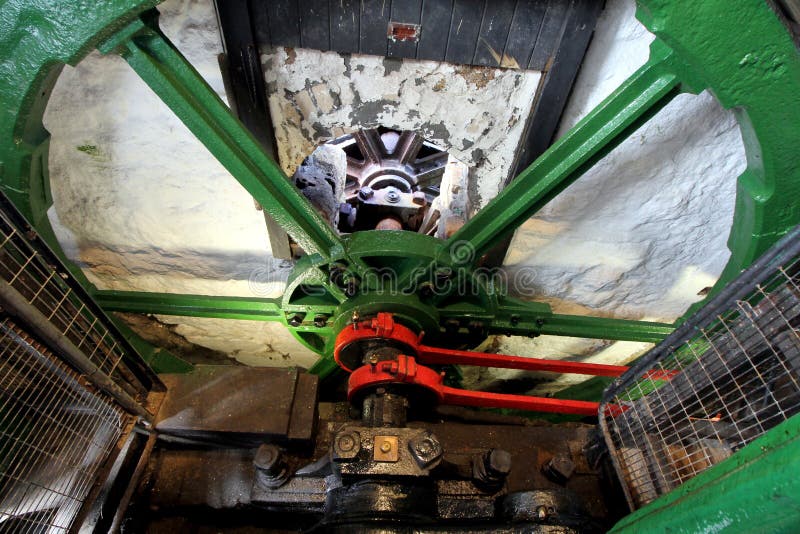 The Huge Steel Flywheel of an Industrial Steam Engine Used at a Stock ...