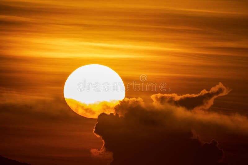 A Huge Sun Rising during Sunrise Stock Image - Image of grass, outdoors ...
