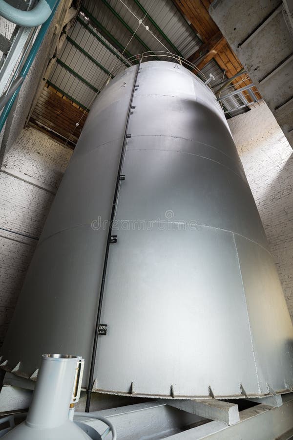 A Huge, Tall Metal Cistern Installed Inside the Building. Stock Image ...