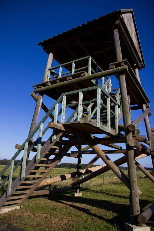 Huge watch tower in field stock photo. Image of building - 263515714