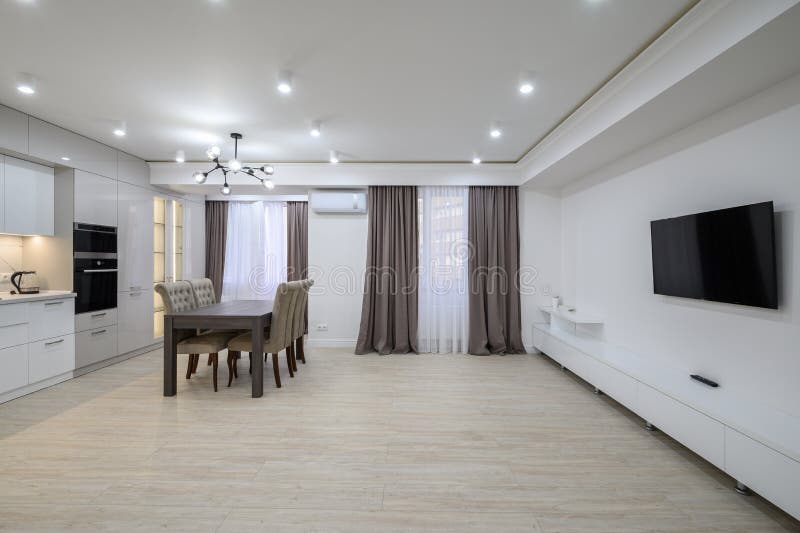 Huge White Luxury Kitchen in a Studio Apartment Interior Stock Photo ...