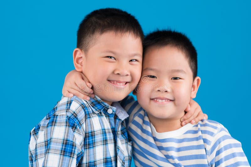 Hugging brothers stock image. Image of face, happy, smiling - 52581225
