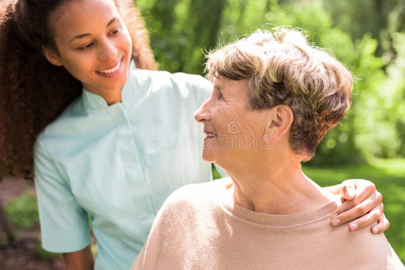 Hugging elder lady stock photo. Image of people, home - 67662372