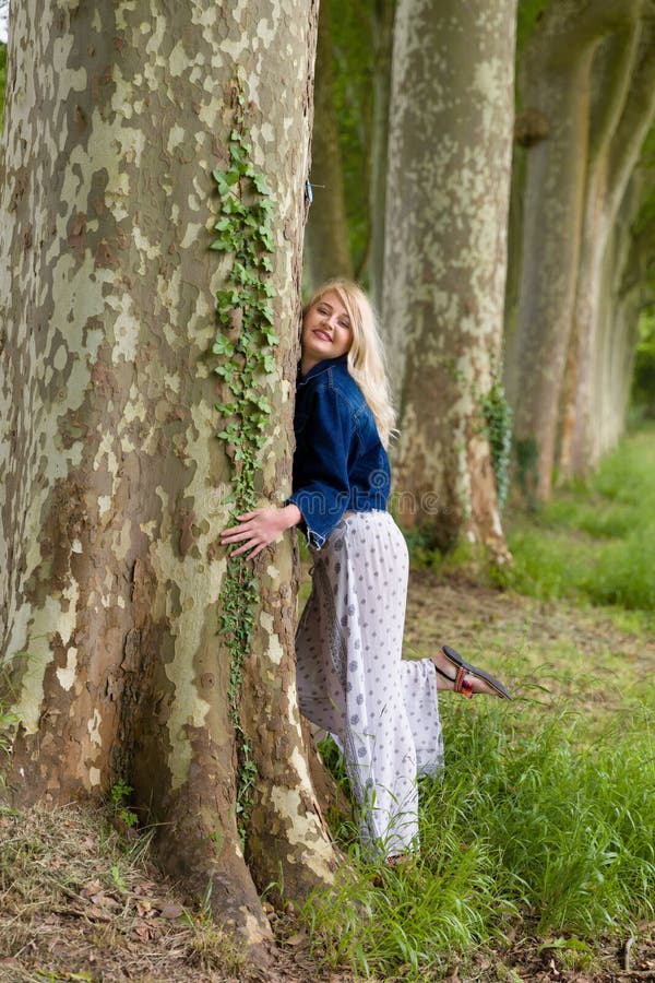 Hugging a tree stock photo. Image of relax, person, people - 174923358