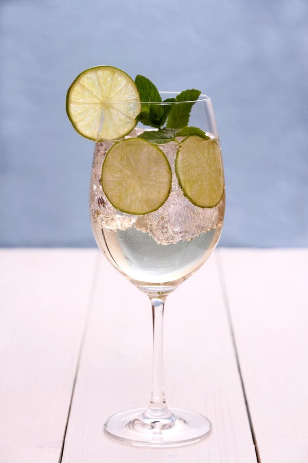 Hugo Cocktail with Lime, Mint and Ice Cubes Stock Photo - Image of ...