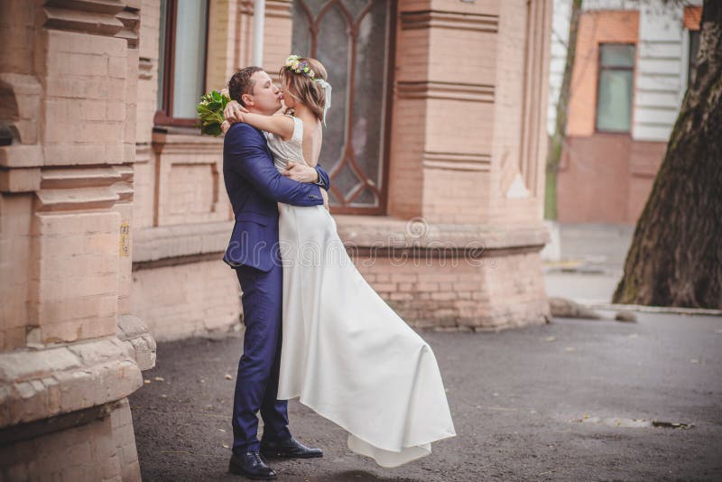 Hugs kiss wedding stock photo. Image of destination, married - 65603362