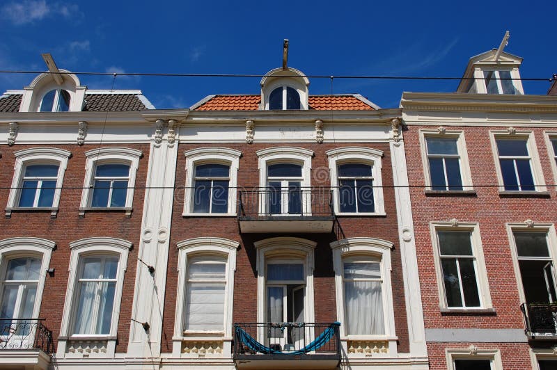 Huizen in Amsterdam stock foto. Image of holland, bestemming - 15551818