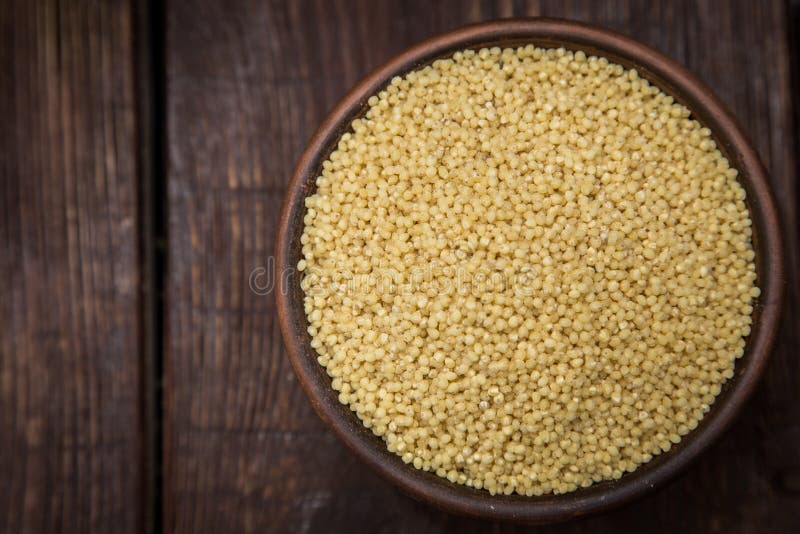Hulled Millet on a Dark Background Stock Image - Image of africa, grain ...
