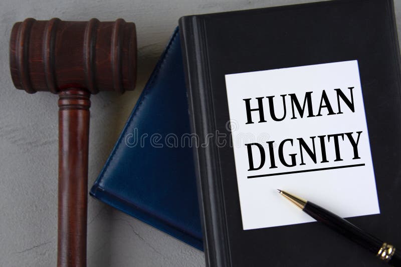 HUMAN DIGNITY - Words on a White Sheet with Leather Notebooks, a Judge ...