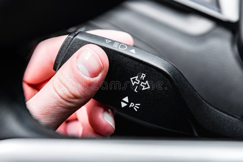 Human Driving Car and Using Turn Signal Switch. Stock Photo - Image of ...