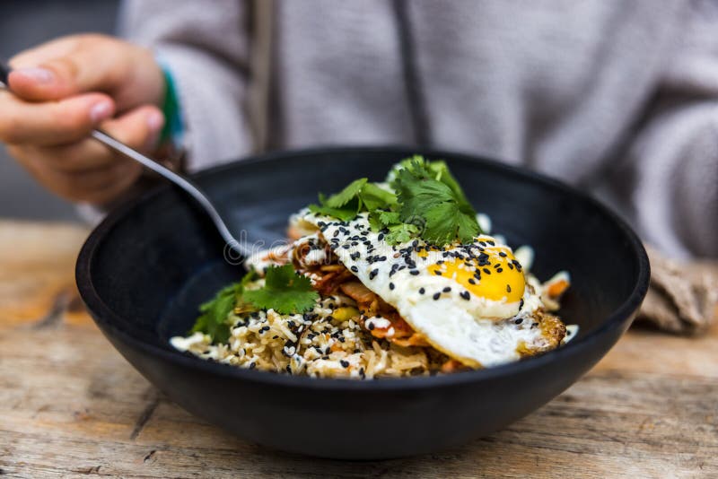 Human Eating Delicious Fried Eggs with Rice Stock Photo - Image of ...