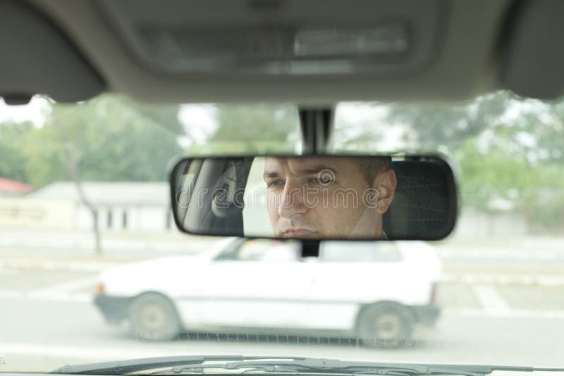 Human Face in the Car Mirror Stock Photo - Image of face, inside: 61042100