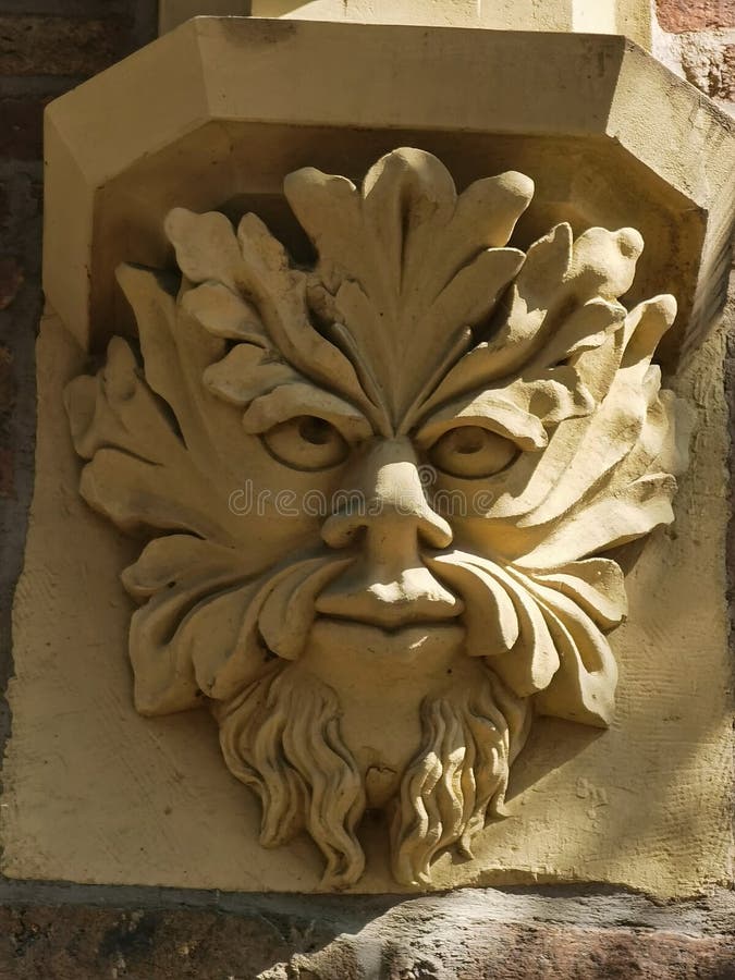 Human Face Carved into Stone Stock Photo - Image of cheerful, happy ...