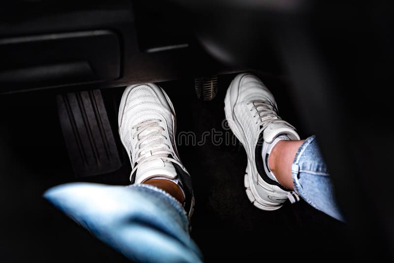 Human Feet Pressing Car Pedal. Stock Image - Image of human, pedal ...